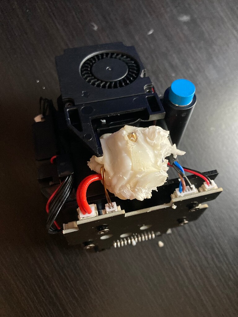 Filament stopped printing on object and then clogged and melted around the nozzle. need help ...